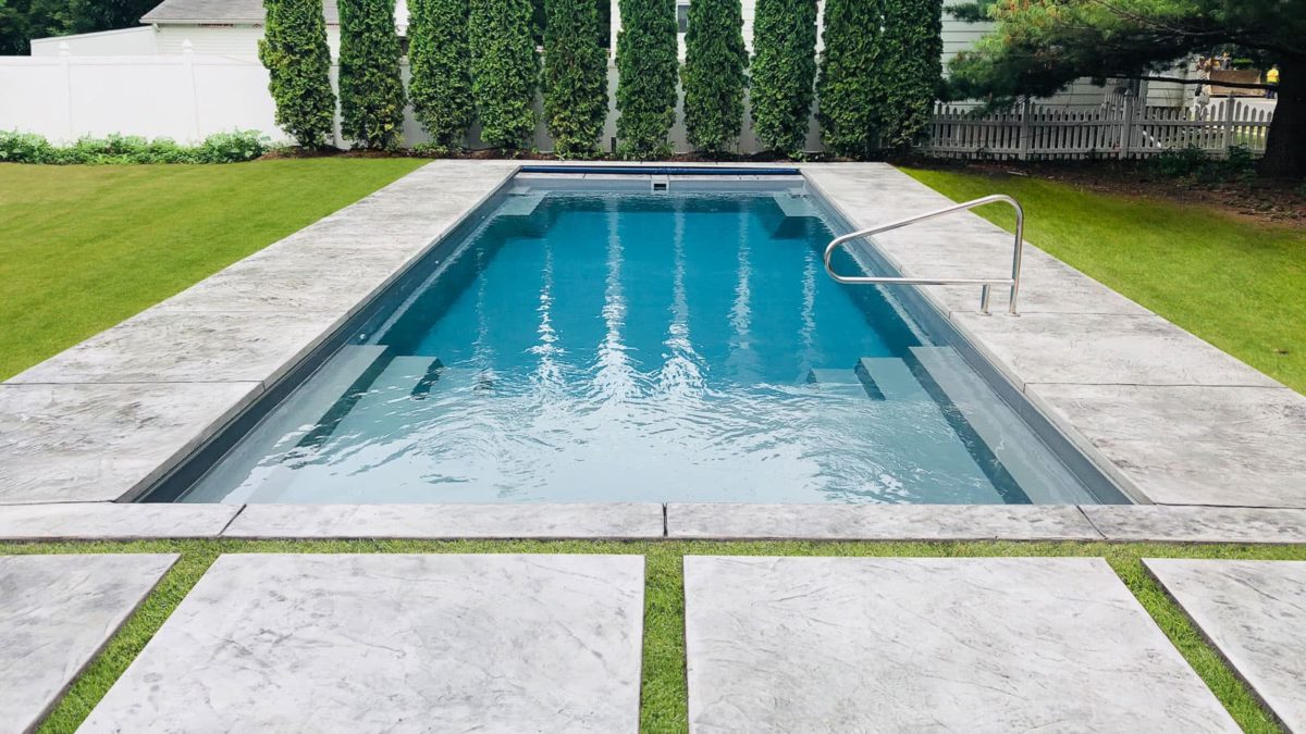 The Illusion - fiberglass swimming pool with splash pad